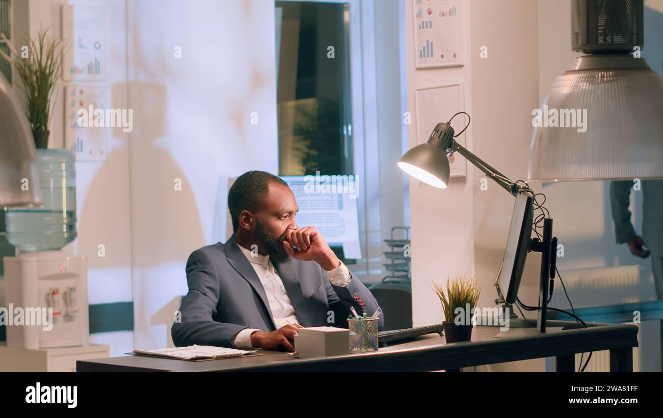 Focused employees analyzing data charts, comparing marketing graphs and checking accounting ...