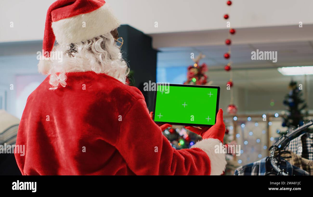 Christmas ornate shopping mall employee impersonating Santa Claus ...