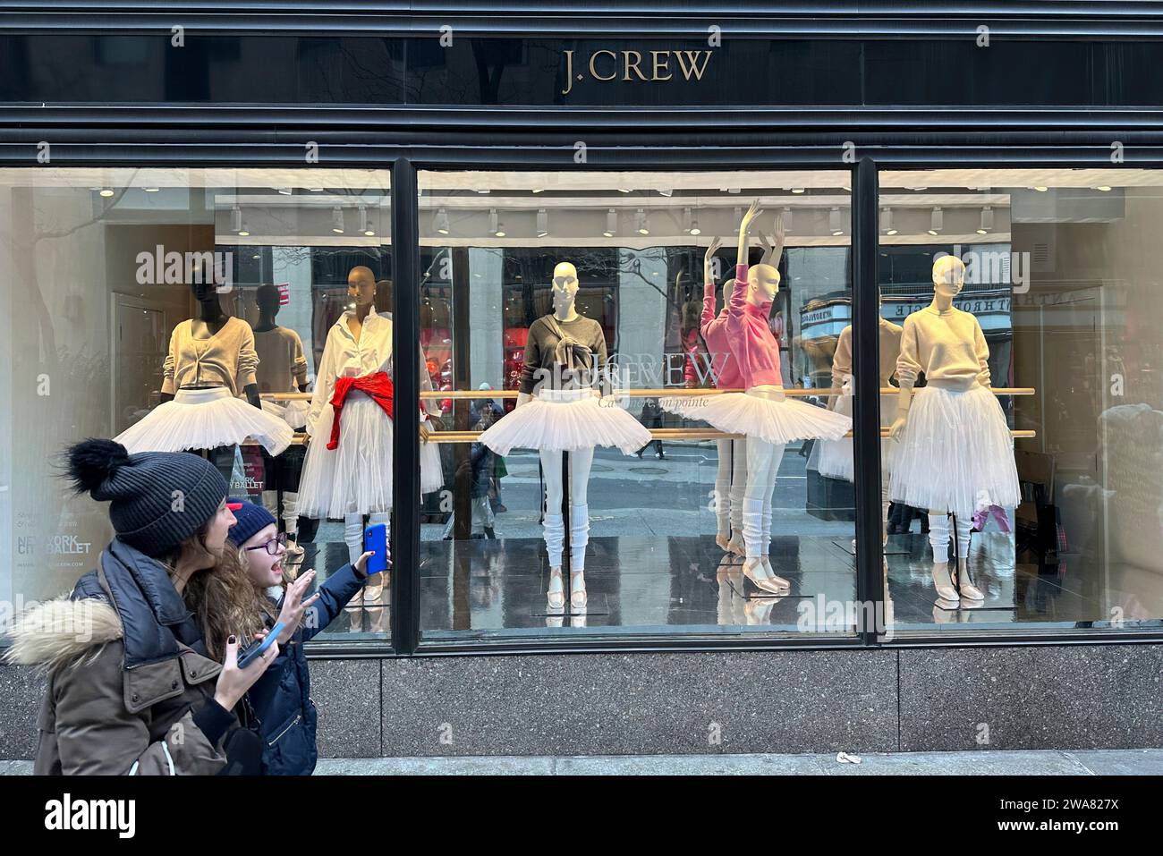 Mannequins dressed as ballet dancers are in the window of a J.Crew ...