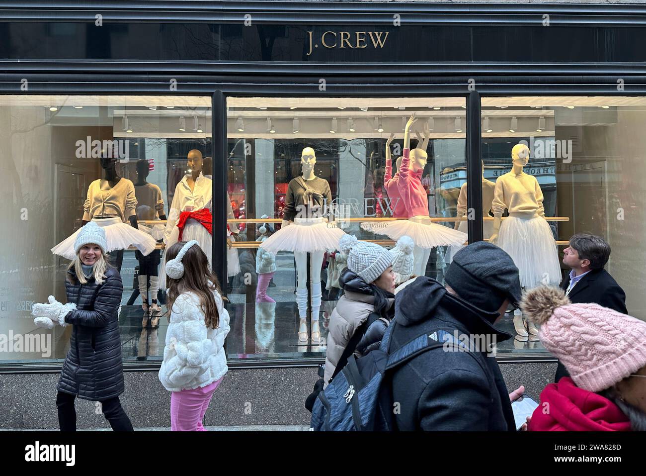 Mannequins dressed as ballet dancers are in the window of a J.Crew ...