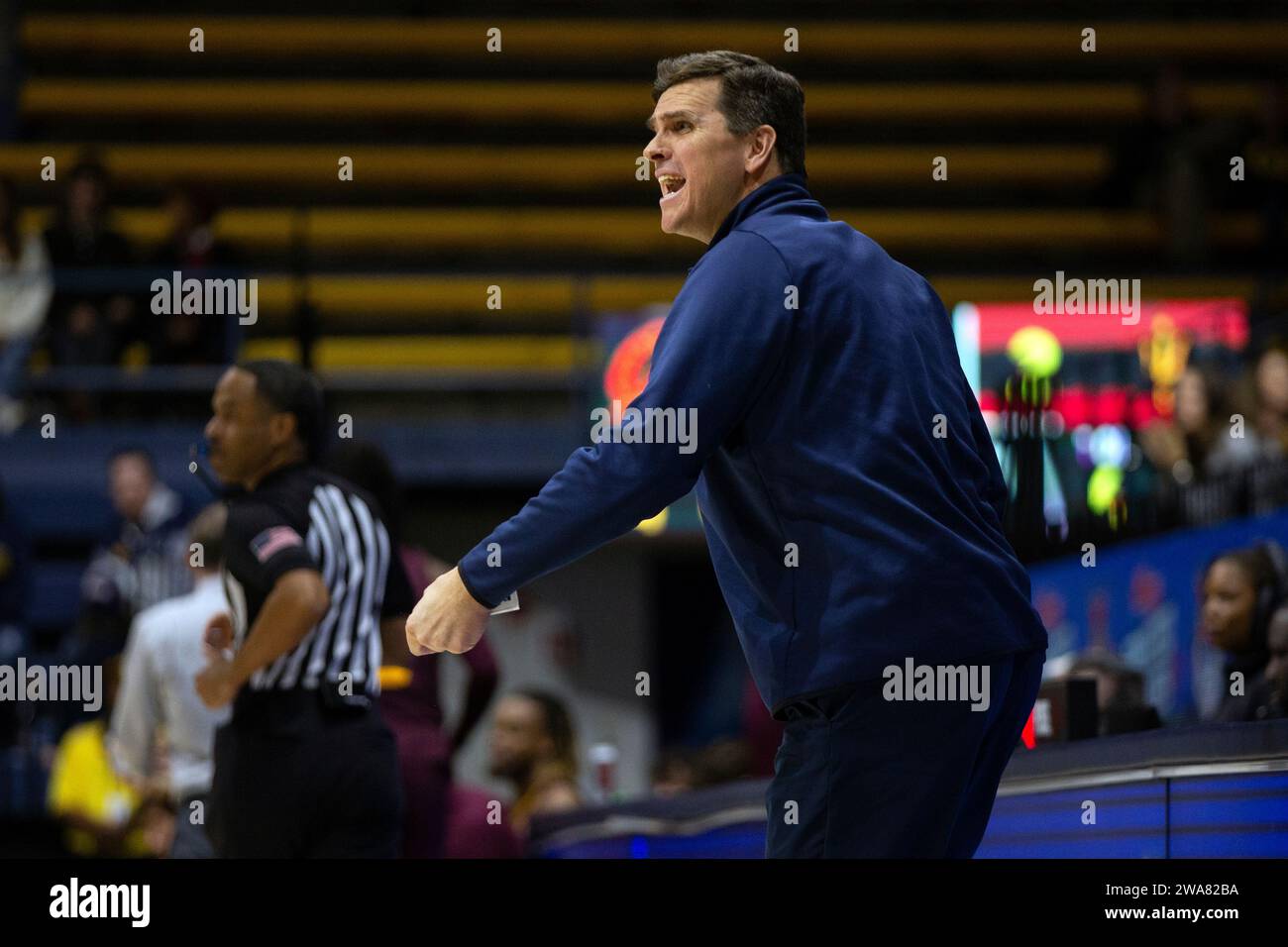 California head coach Mark Madsen shouts instructions to his players ...