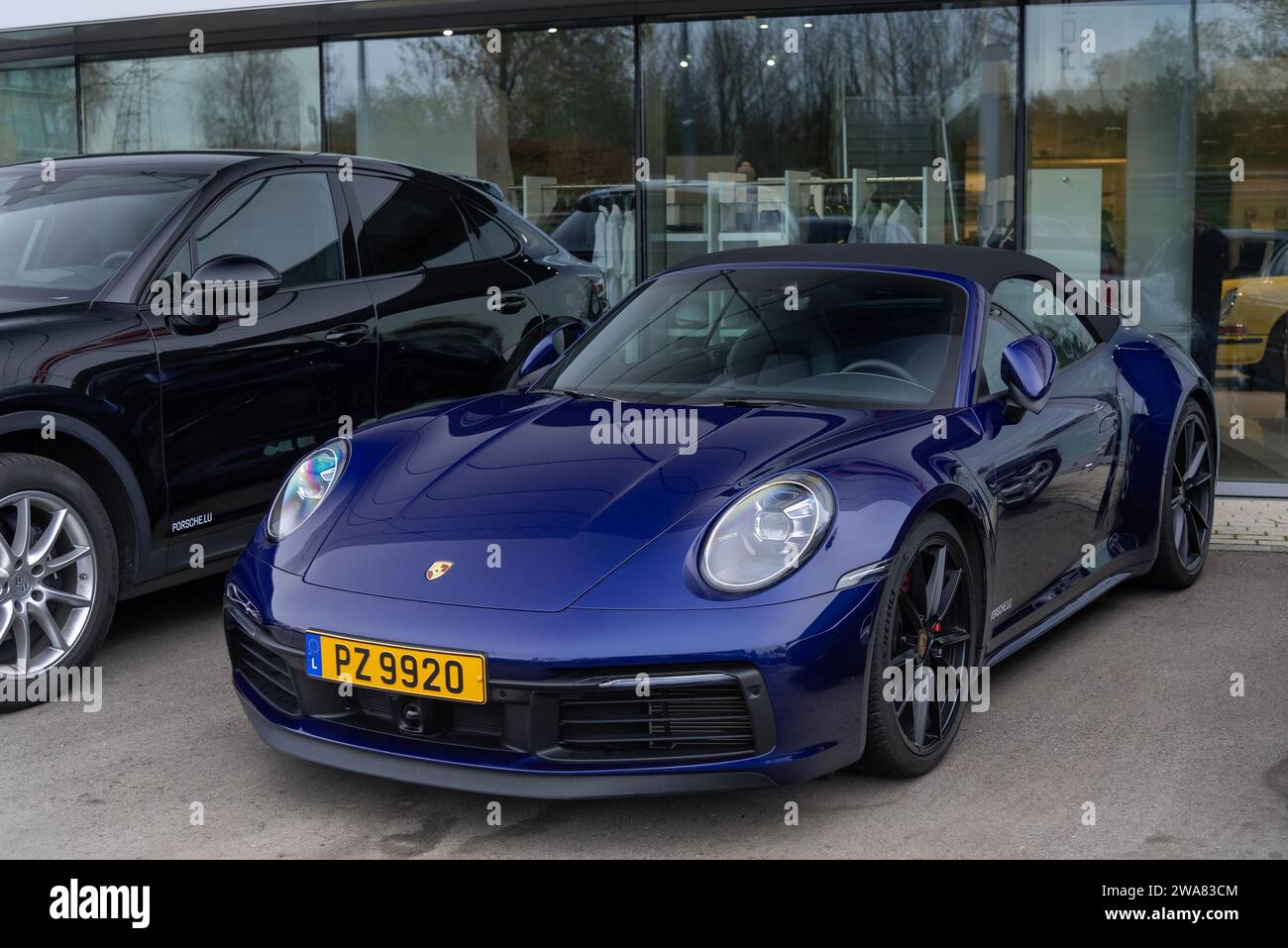 Luxembourg City, Luxembourg - Blue Porsche 992 Carrera 4S Cabriolet ...