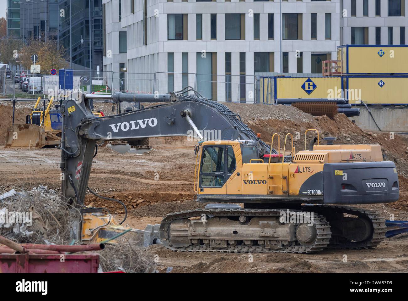 Luxembourg City, Luxembourg - Yellow and dark grey crawler excavator ...