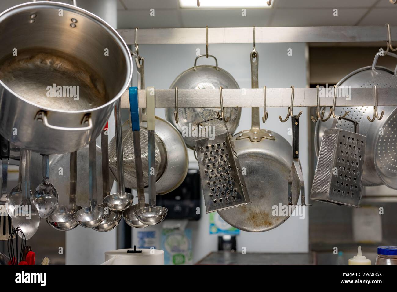 Hanging pans in kitchen hi-res stock photography and images - Alamy