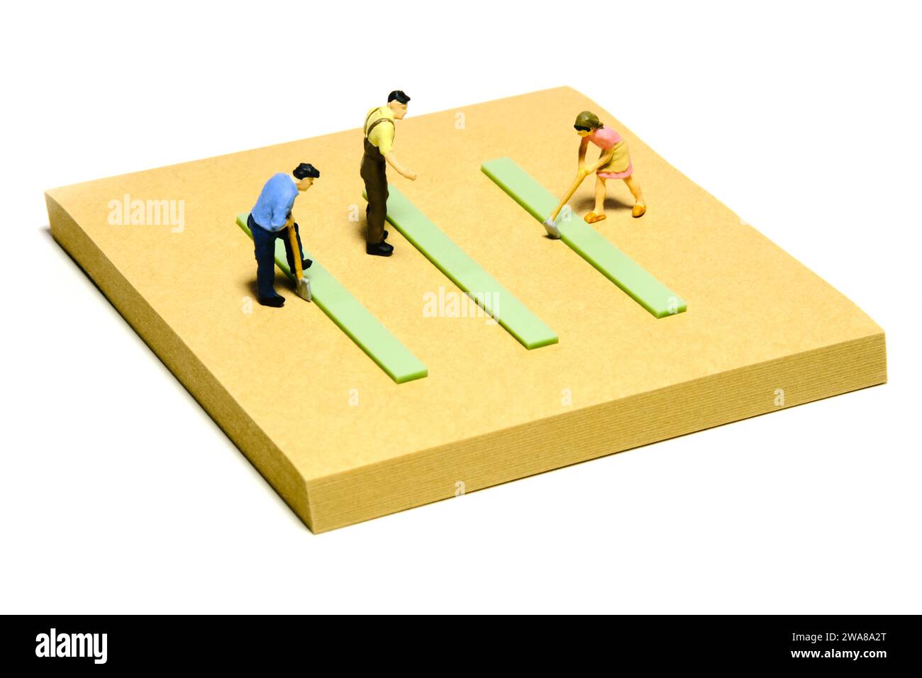 Creative miniature people toy figure photography. Sticky notes ...