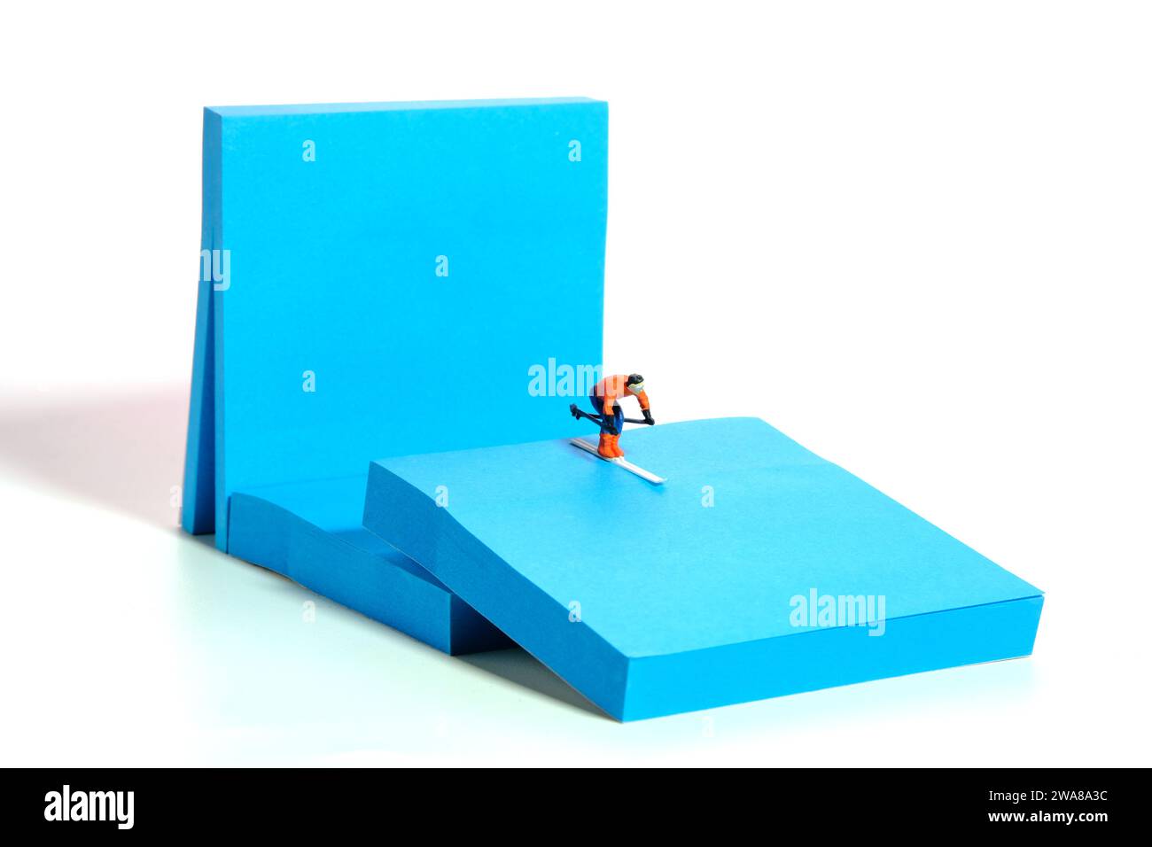 Creative miniature people toy figure photography. Winter sport sticky ...