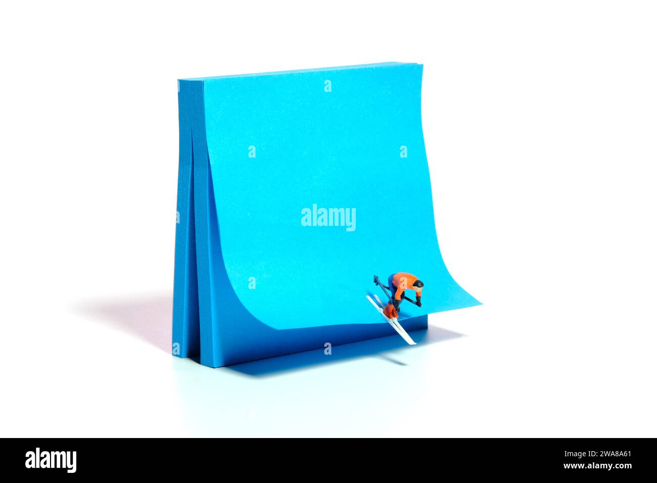 Creative miniature people toy figure photography. Winter sport sticky ...