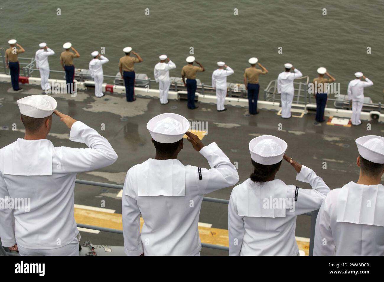 Us navy sailors salute during hi-res stock photography and images - Alamy