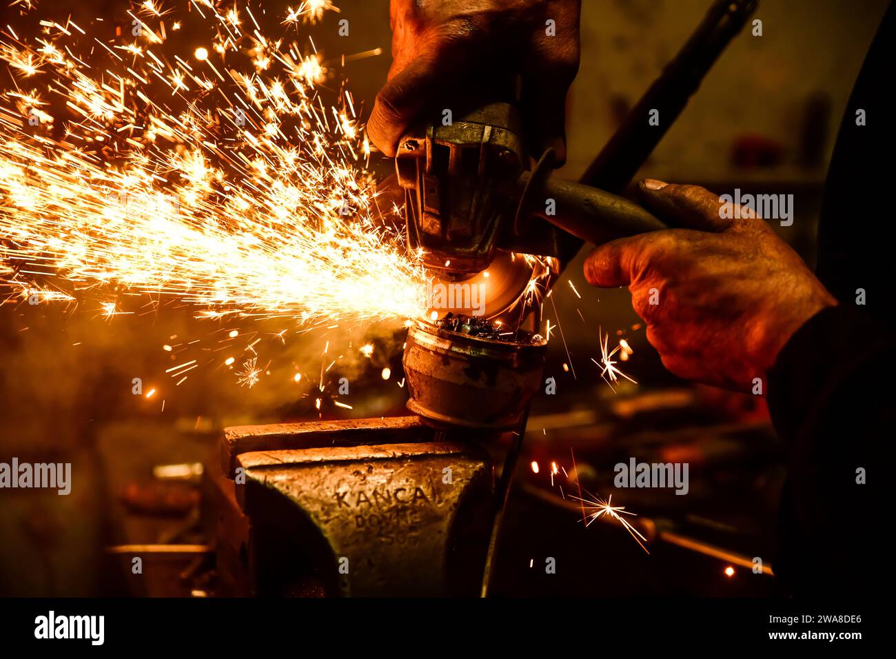 Flashing Sparks Coming From the Angle Grinder Stock Photo - Alamy