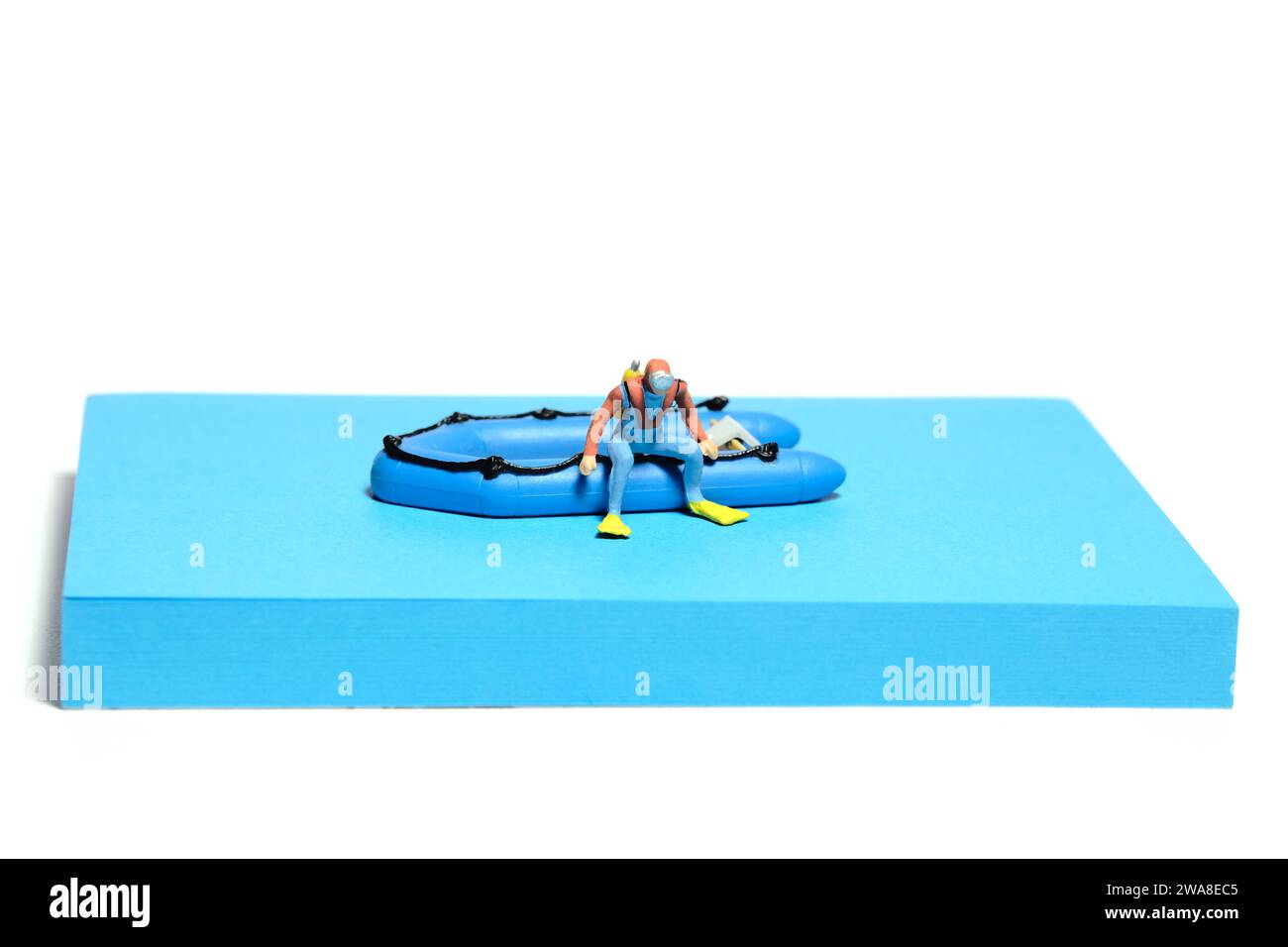 Creative miniature people toy figure photography. Sticky notes ...