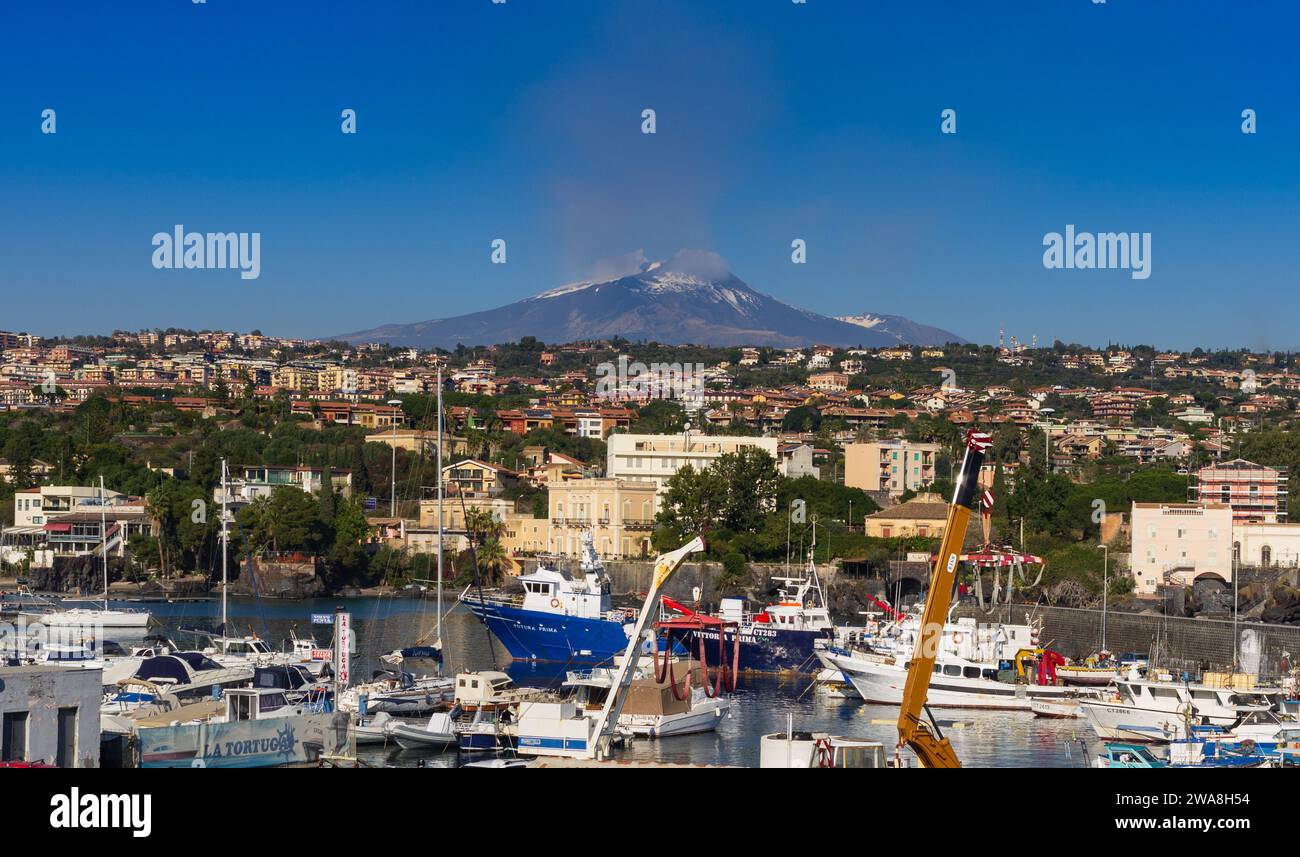 View of the Etna volcano from the port of Ognina, Catania, Sicily Stock ...