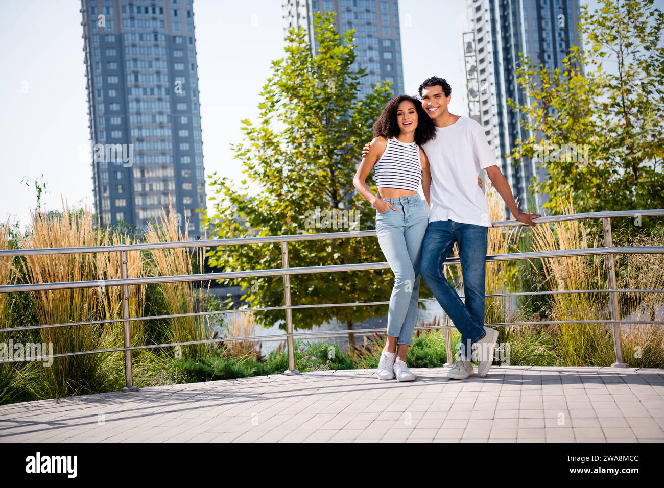 Photo of sweet charming married couple dressed casual outfits enjoying ...