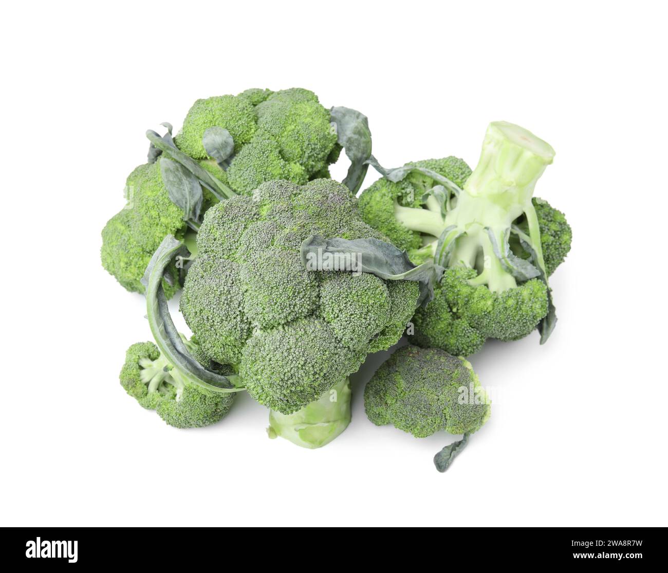 Pile of fresh raw green broccoli isolated on white Stock Photo - Alamy