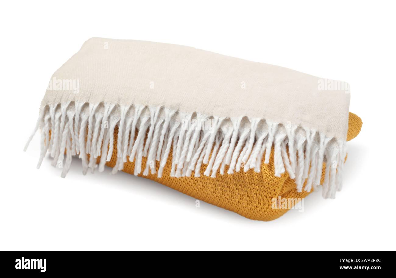 Stack of folded warm blankets isolated on white Stock Photo - Alamy