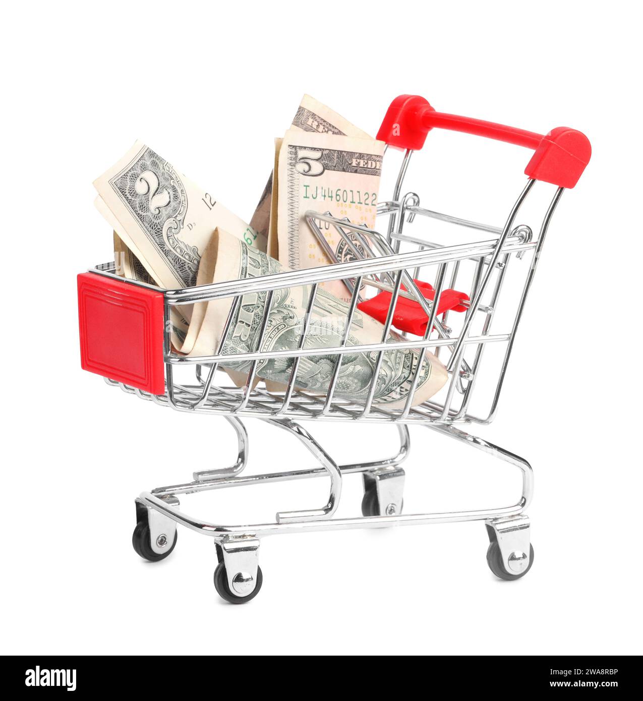 Small metal shopping cart with dollar bills isolated on white Stock ...