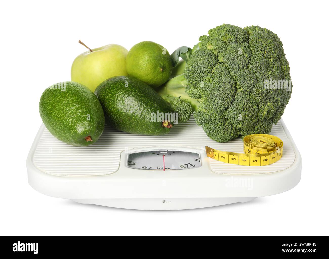 Healthy diet. Scale with products and measuring tape isolated on white ...
