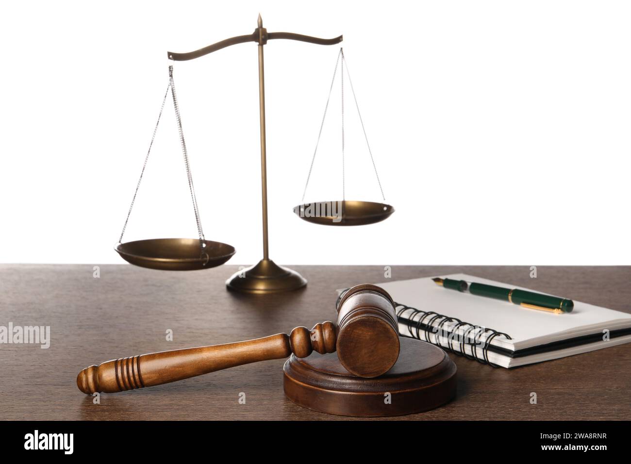 Law concept. Gavel, scales of justice, notebook and pen on wooden table ...