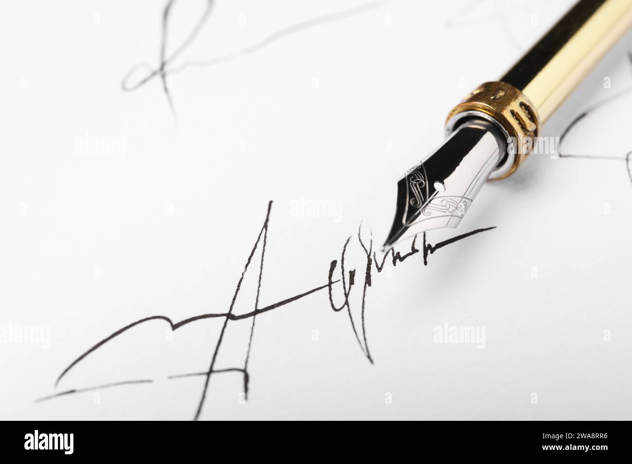 Sheet of paper with fountain pen and signature, closeup Stock Photo - Alamy