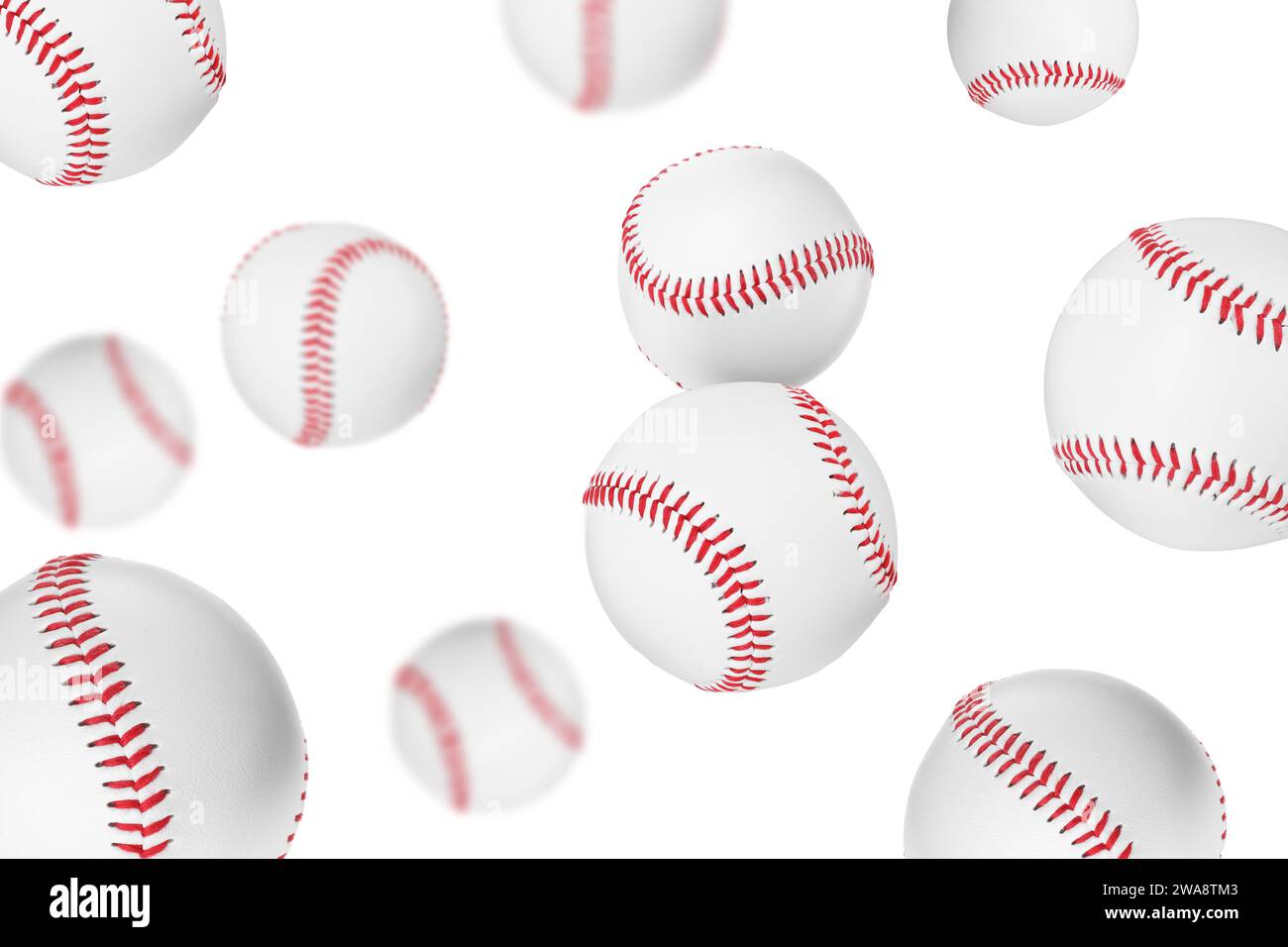 Many baseball balls flying on white background Stock Photo - Alamy