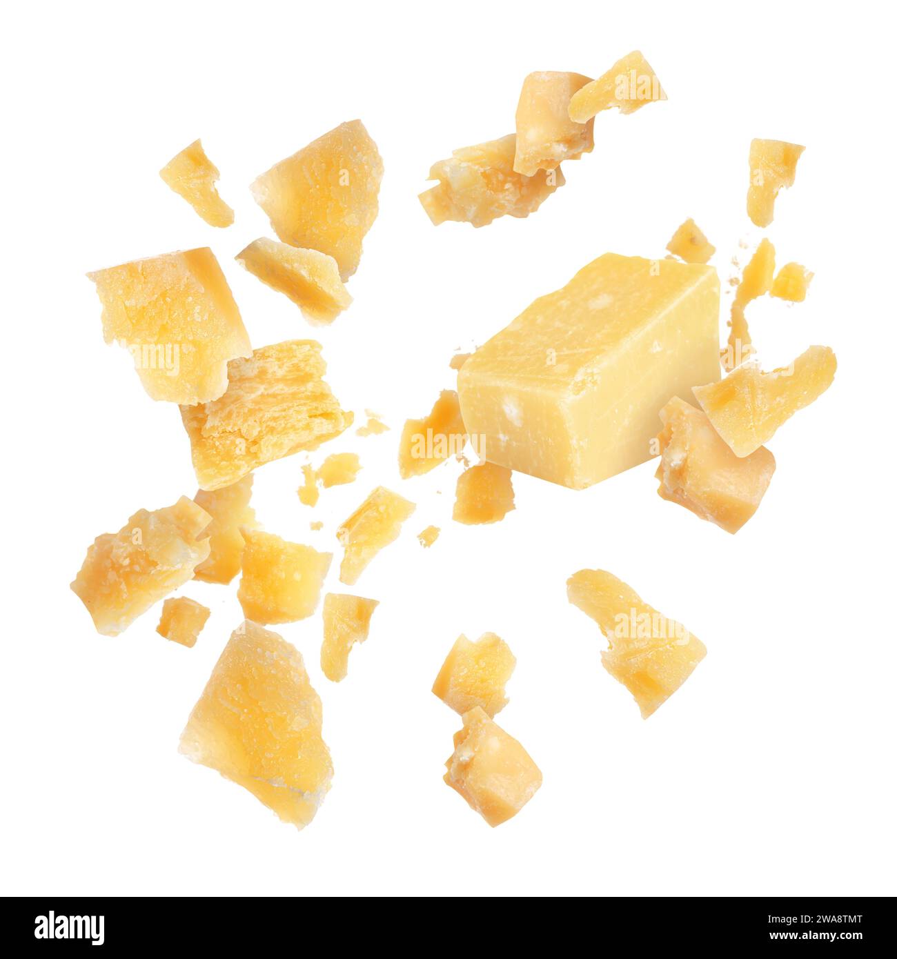 Tasty parmesan cheese falling on white background Stock Photo - Alamy