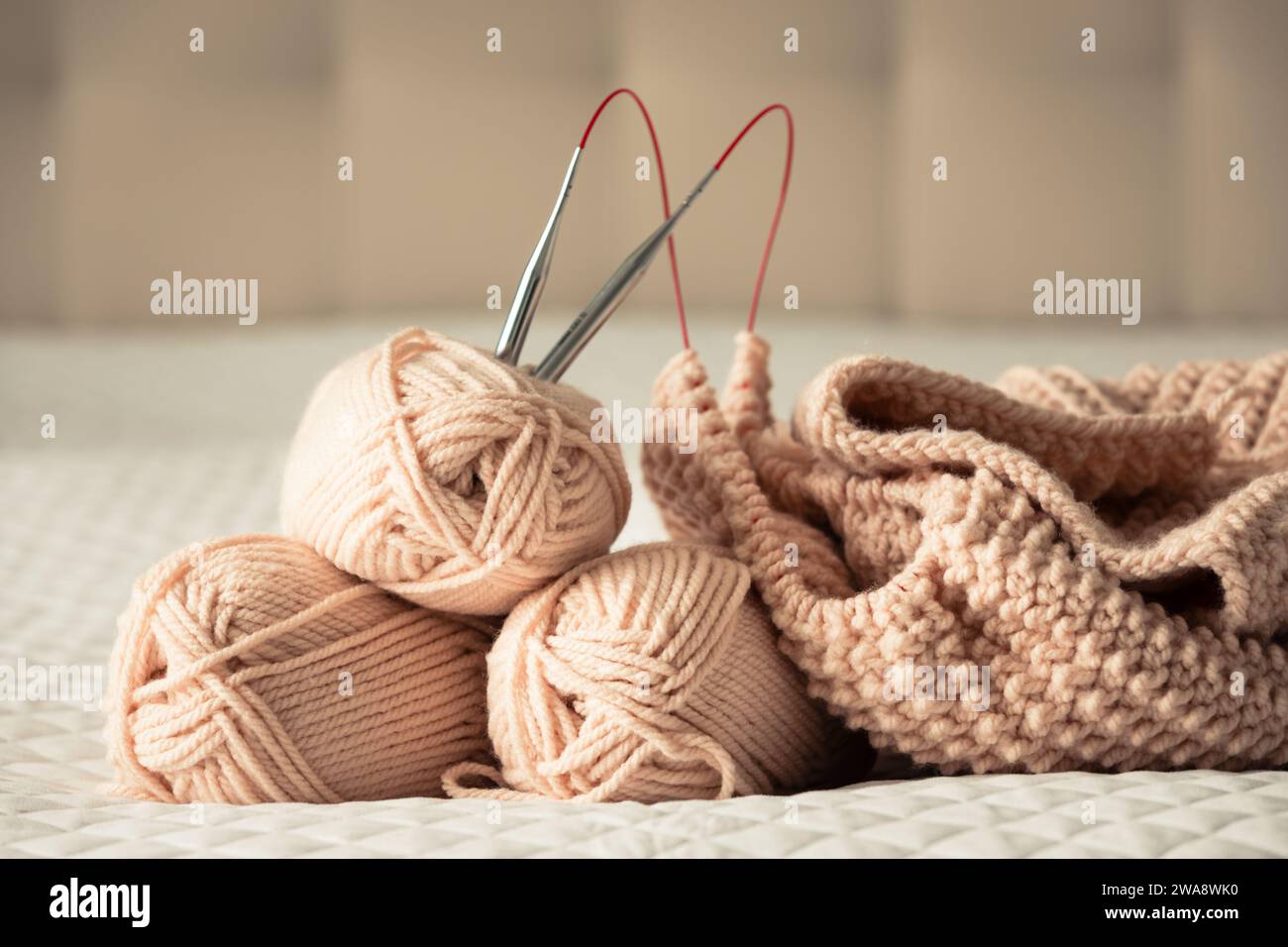 Knitting yarn, needles, chunky sweater. Cozy homely atmosphere. Yarn in ...