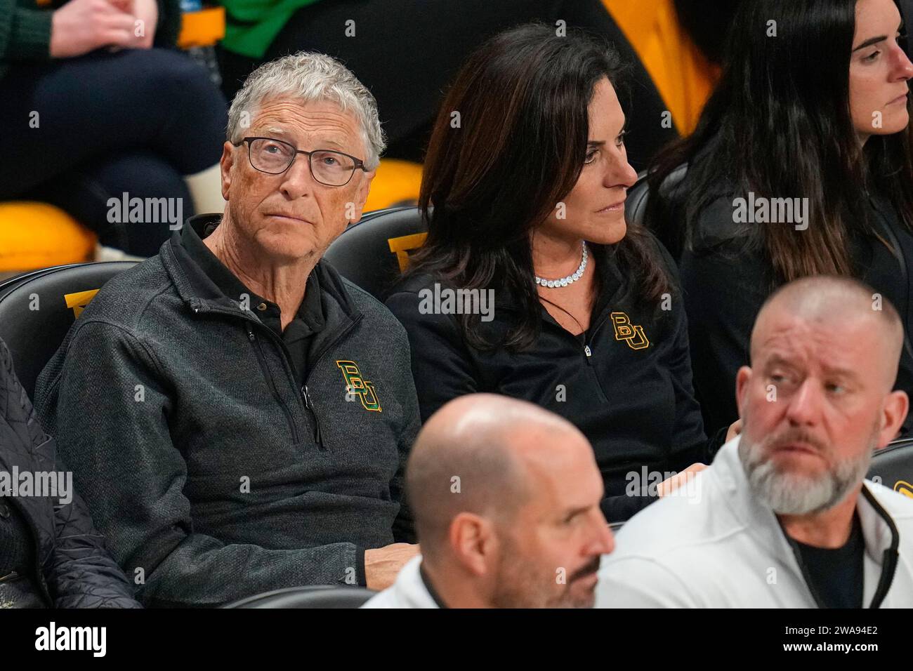 Bill Gates, left, sits with his girlfriend, Paula Hurd, during the ...