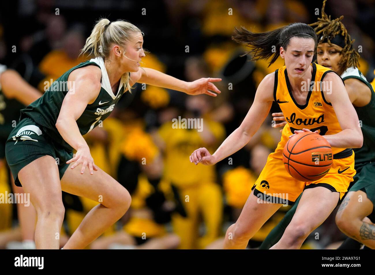 Iowa guard Caitlin Clark (22) drives past Michigan State guard Tory ...