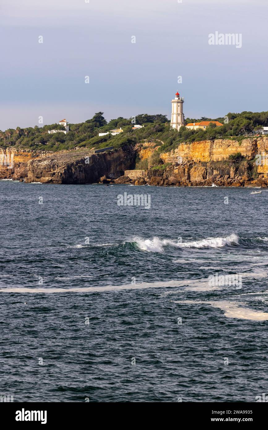 Boca do Inferno with a view of the Farol da Guia lighthouse, Cascais ...