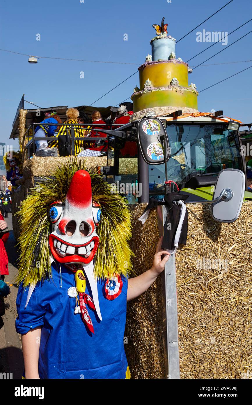 Active carnival reveller as a classic carnival figure Waggis of a wagon ...