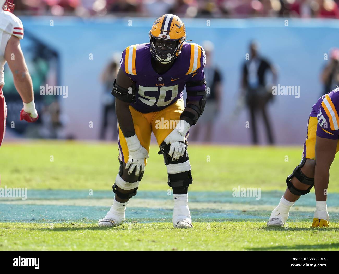 LSU Tigers offensive lineman Emery Jones Jr. (50) getting in his stance ...