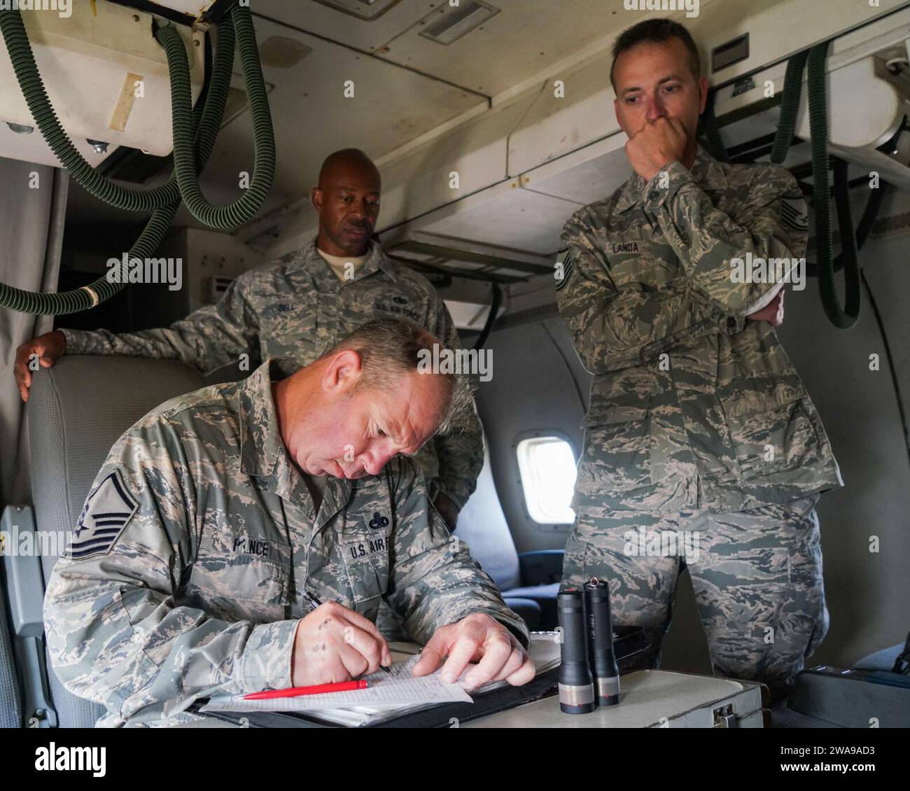 US military forces. U.S. Air Force Master Sgt. David Prince, center, a ...