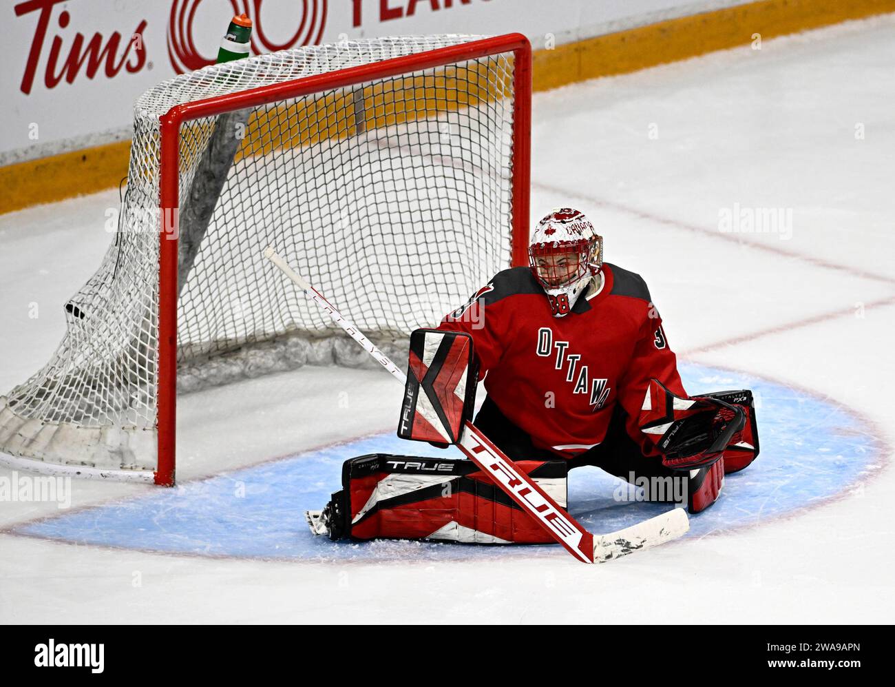 The puck goes in the net behind Ottawa's Emerance Maschmeyer (38) on a ...