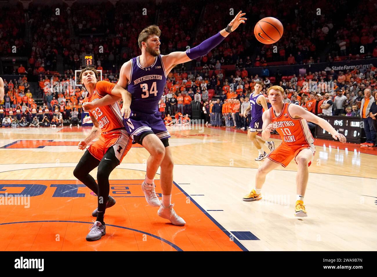 Northwestern's Matthew Nicholson (34) is unable to get a pass as ...