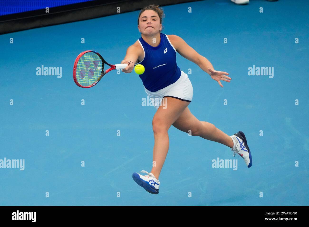 Italy's Jasmine Paolini plays a forehand return to Caroline Garcia of ...