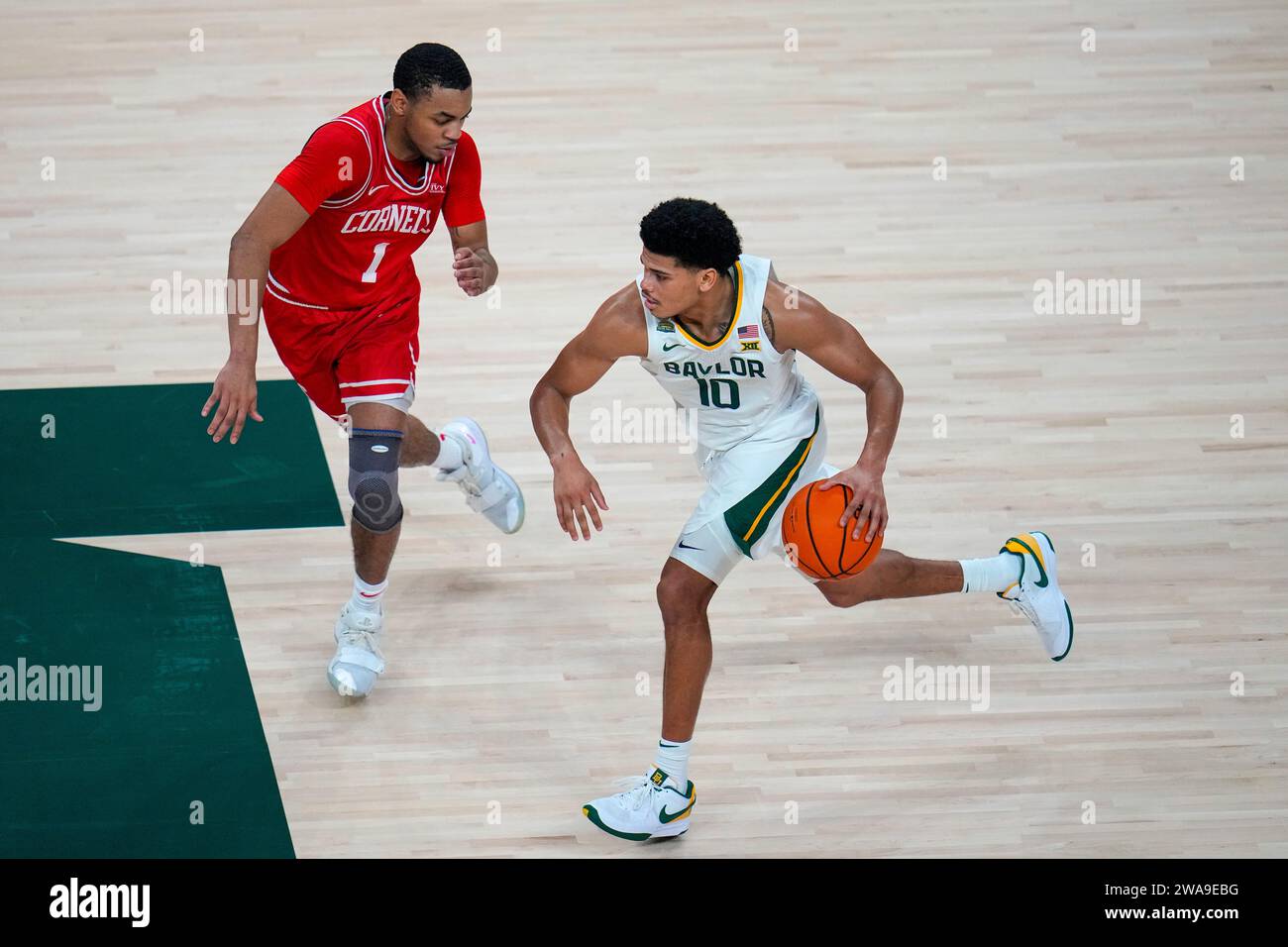Baylor guard RayJ Dennis (10) drives against Cornell guard Nazir ...