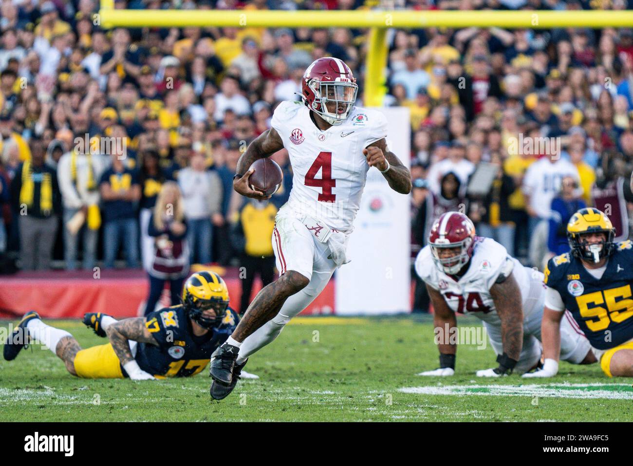 Alabama Crimson Tide quarterback Jalen Milroe (4) runs the ball during the CFP Semifinal at the ...