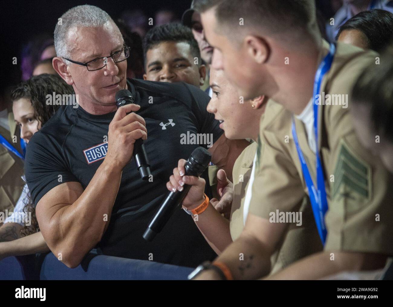US military forces. Chef Robert Irvine addresses a service member at ...