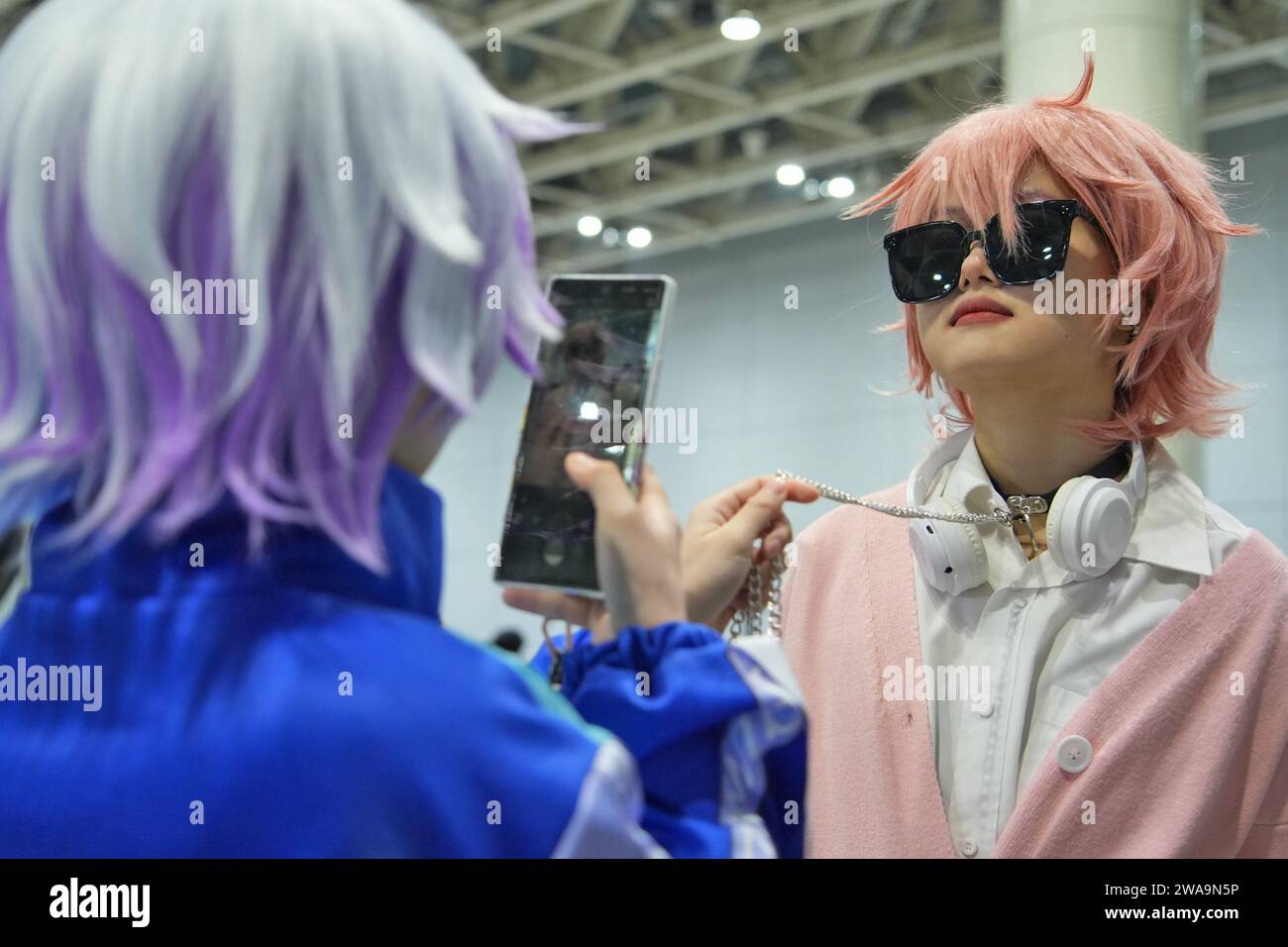 YANTAI, CHINA - JANUARY 1, 2024 - Cosplayers display characters in Two ...