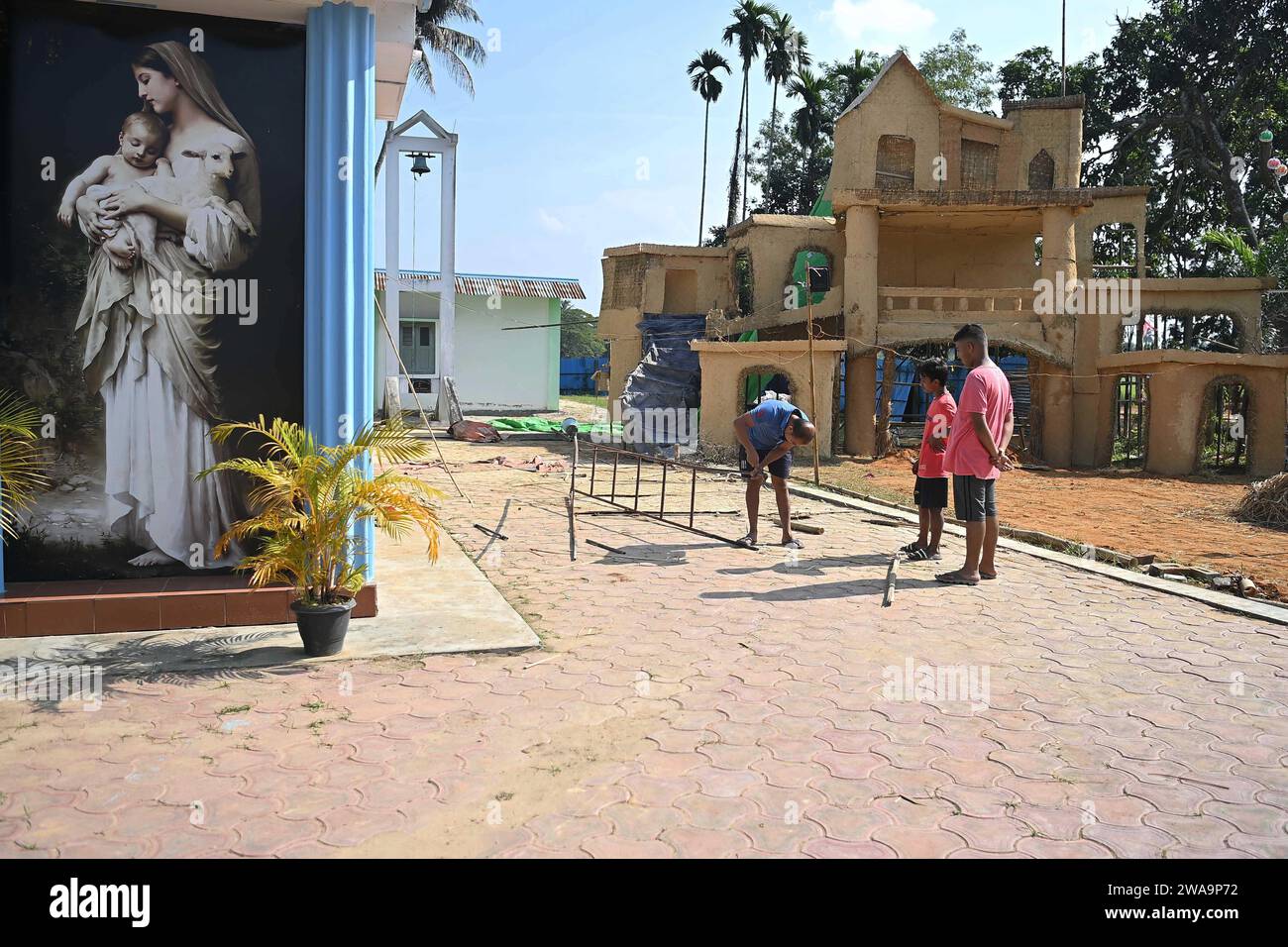People decorate a church in preparation for Christmas Day at Mariam ...