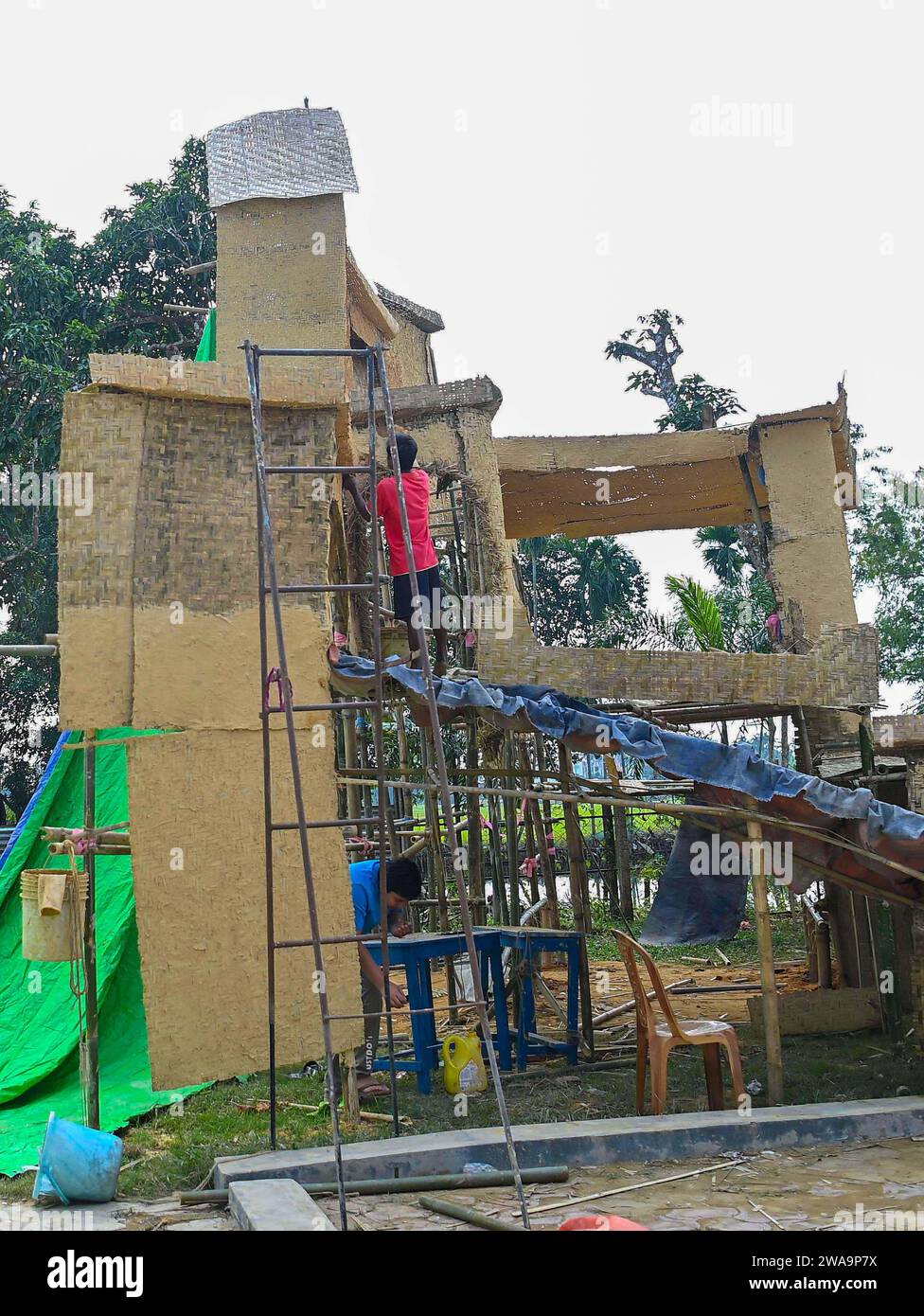 People decorate a church in preparation for Christmas Day at Mariam ...