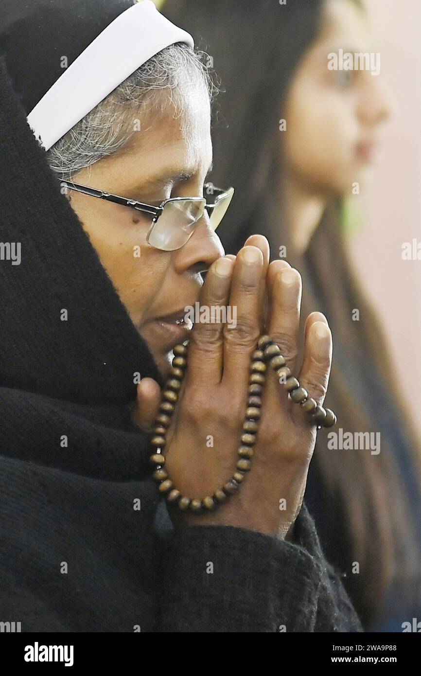 Christians attend a Christmas Mass in Mariam Nagar Church at Agartala ...