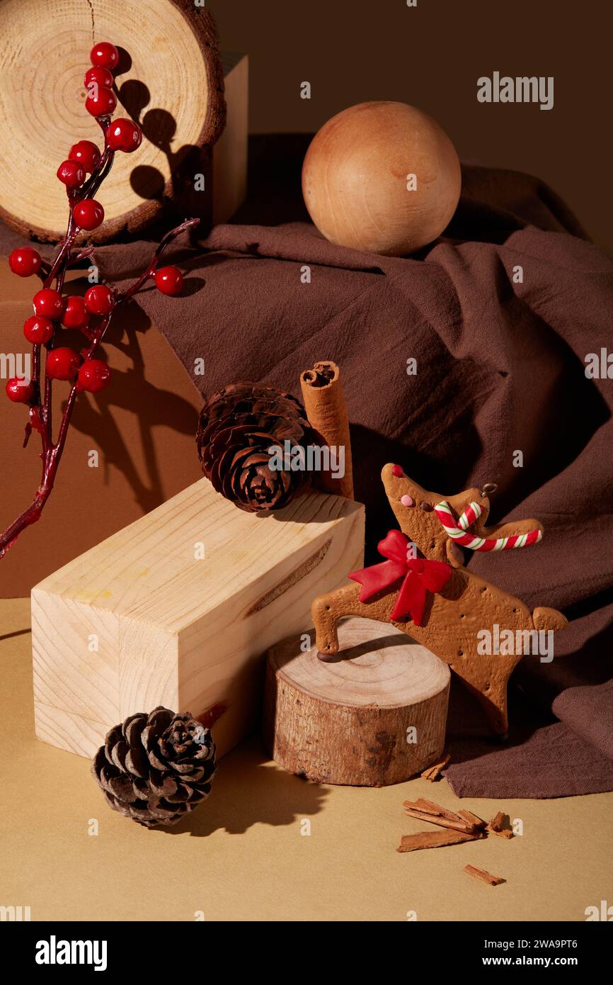 Rectangle and cylinder podiums decorated with a reindeer cake, cinnamon ...