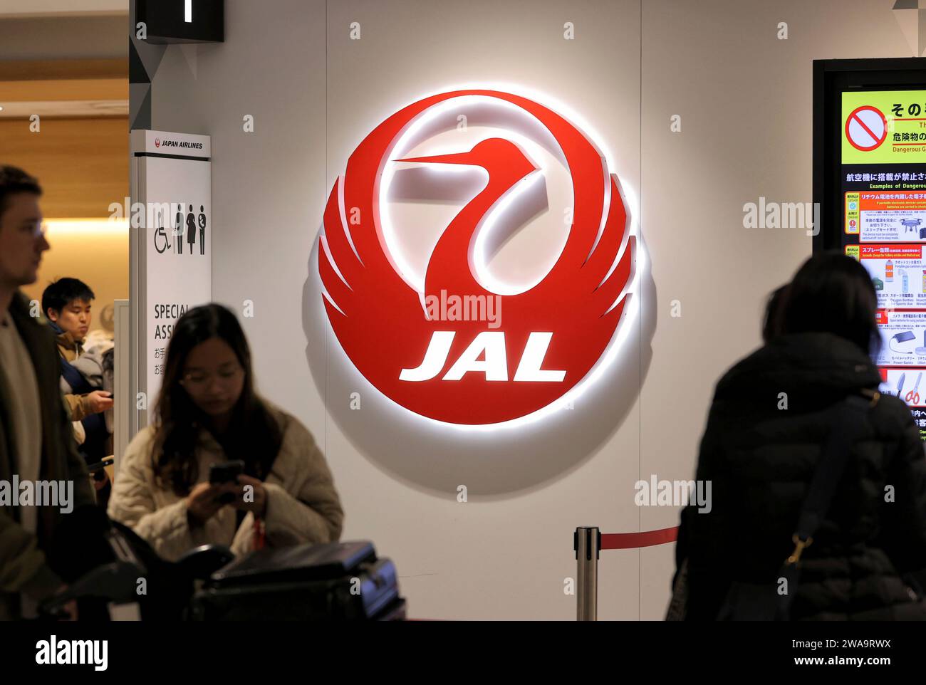 Passengers check in Japan Airlines counter at Shin-Chitose Airport in Hokkaido on Jan.3rd, 2024 ...