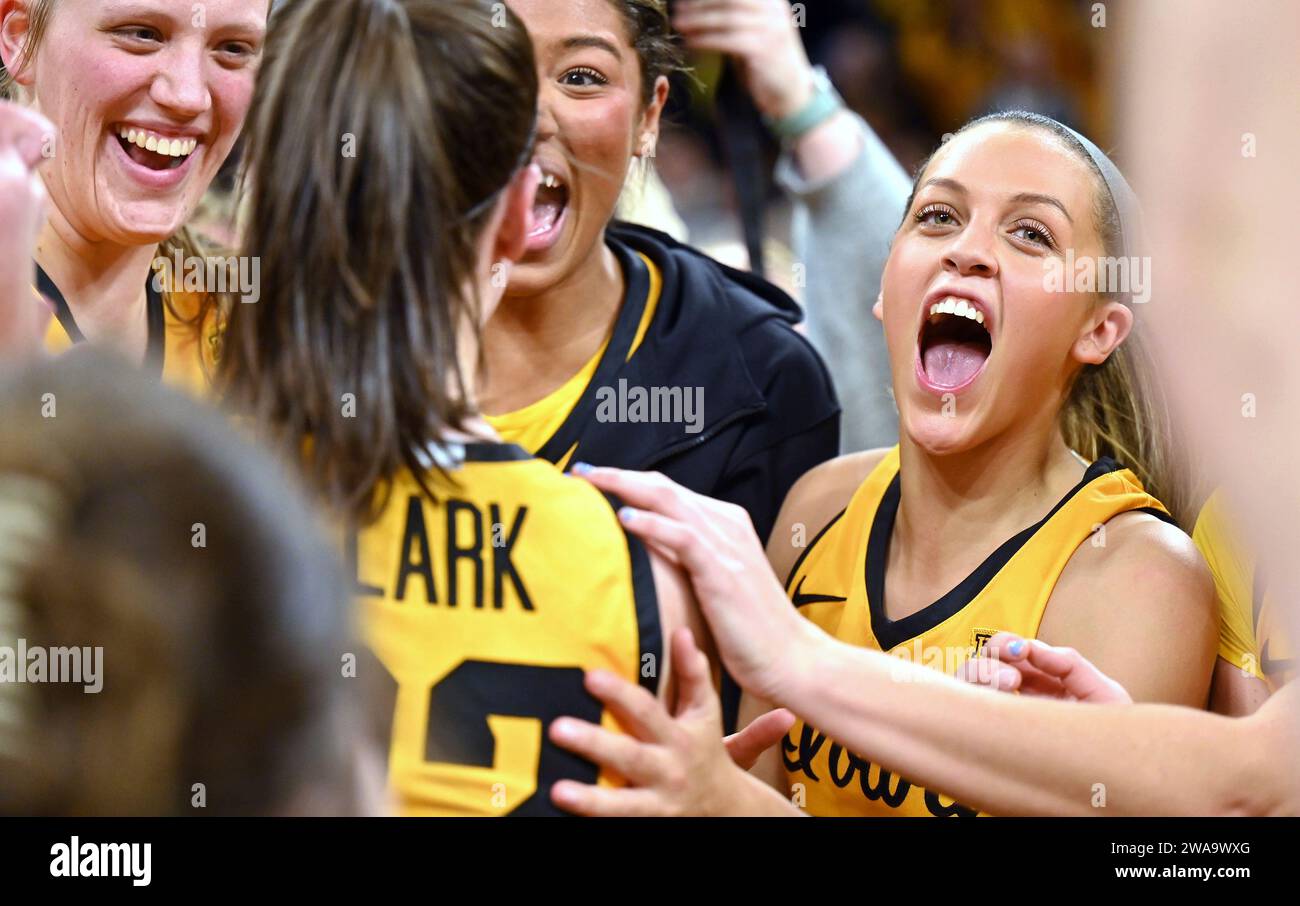 IOWA CITY, IA - JANUARY 02: Iowa guard Caitlin Clark (22) is surrounded ...