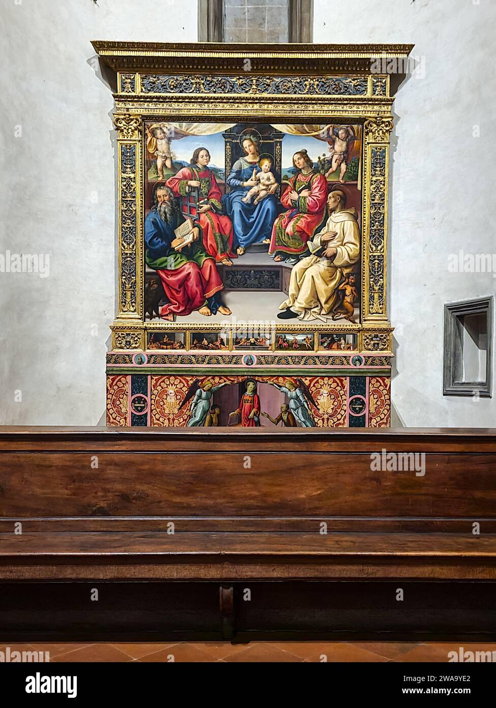 Florence, Italy. 25th Dec, 2023. The painting depicting "Madonna at the ...