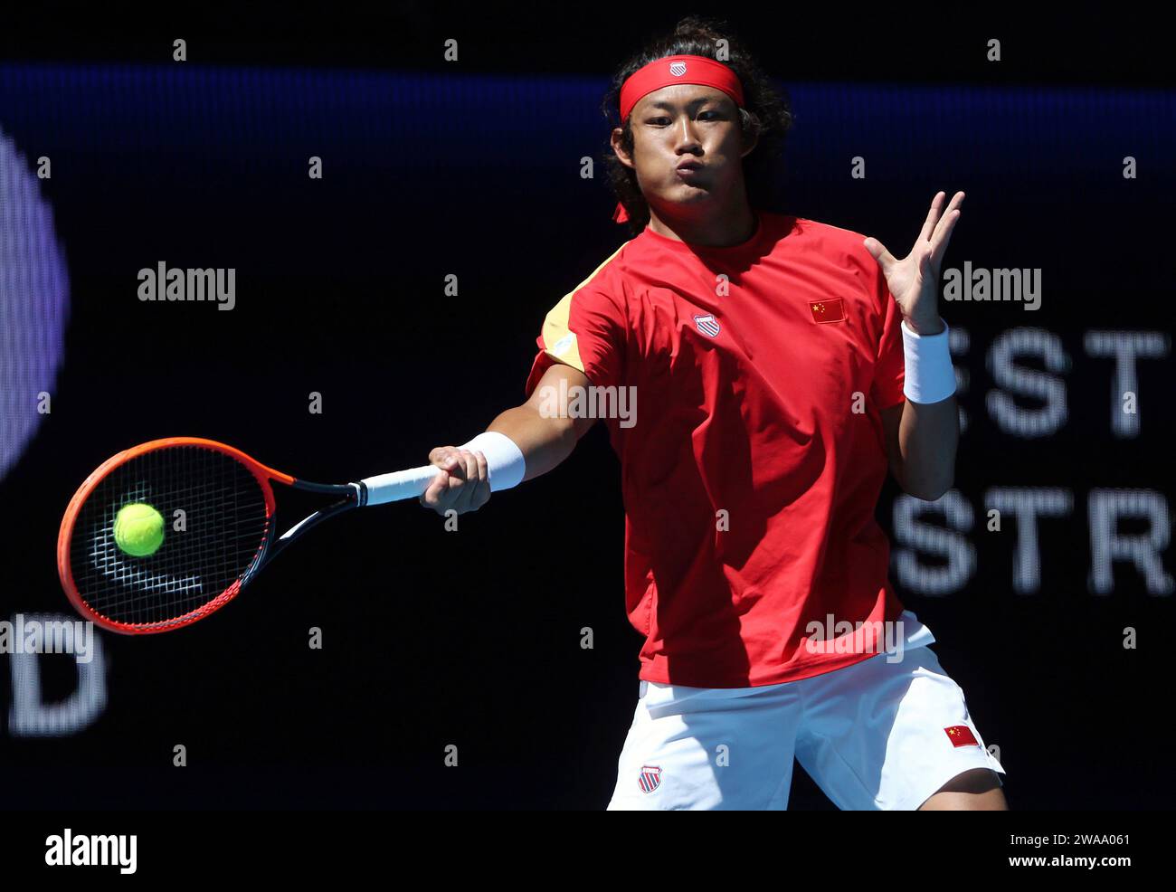 Perth, Australia. 3rd Jan, 2024. Zhang Zhizhen of China hits a shot to ...