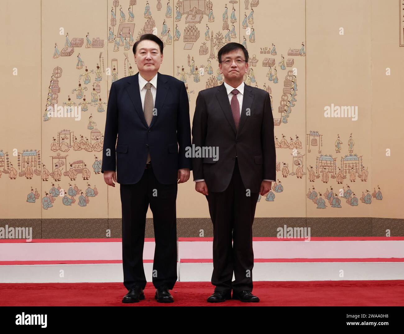 03rd Jan, 2024. New finance minister President Yoon Suk Yeol (L) poses ...