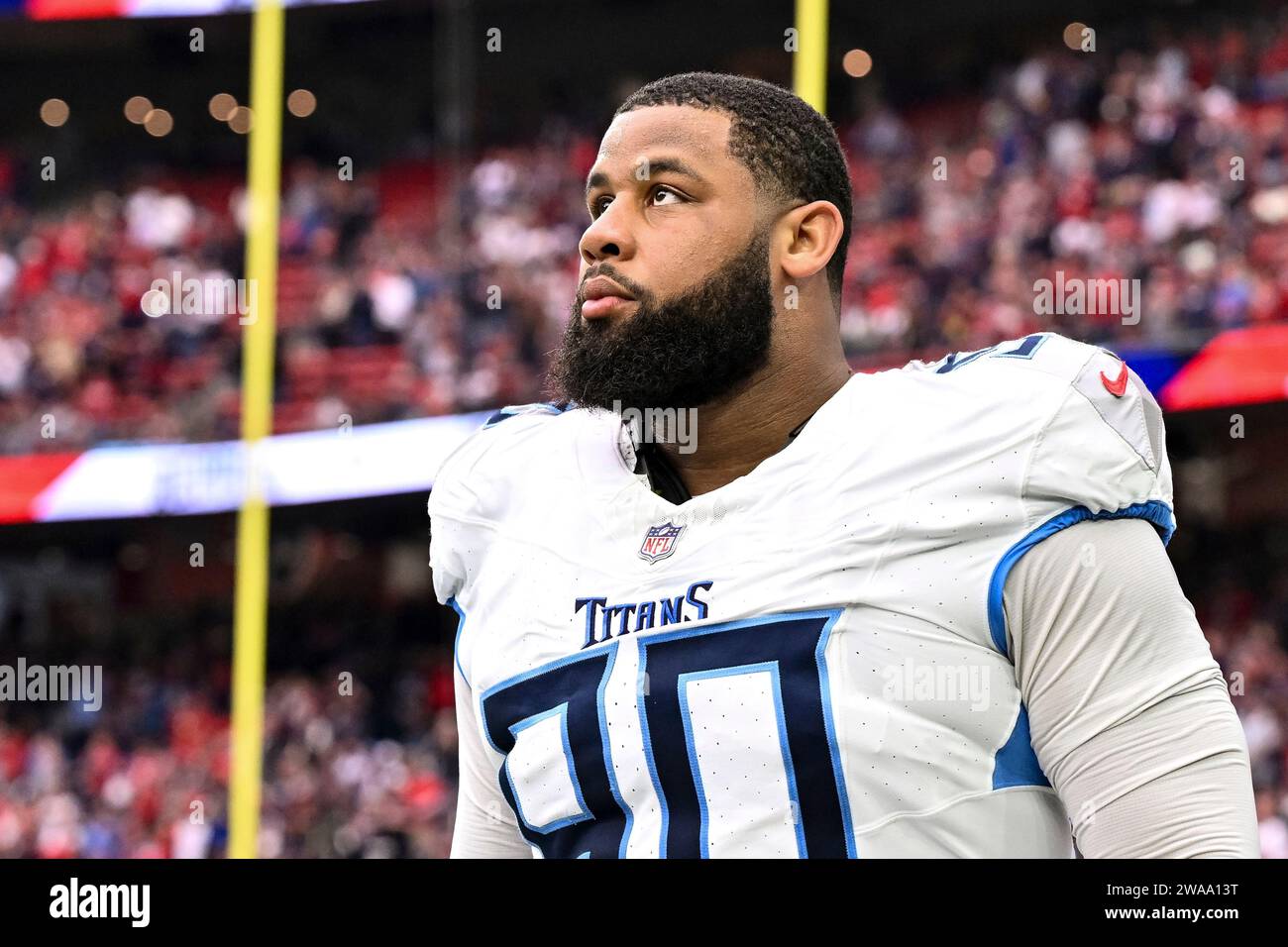 Tennessee Titans defensive tackle Ross Blacklock (90) walks onto the ...