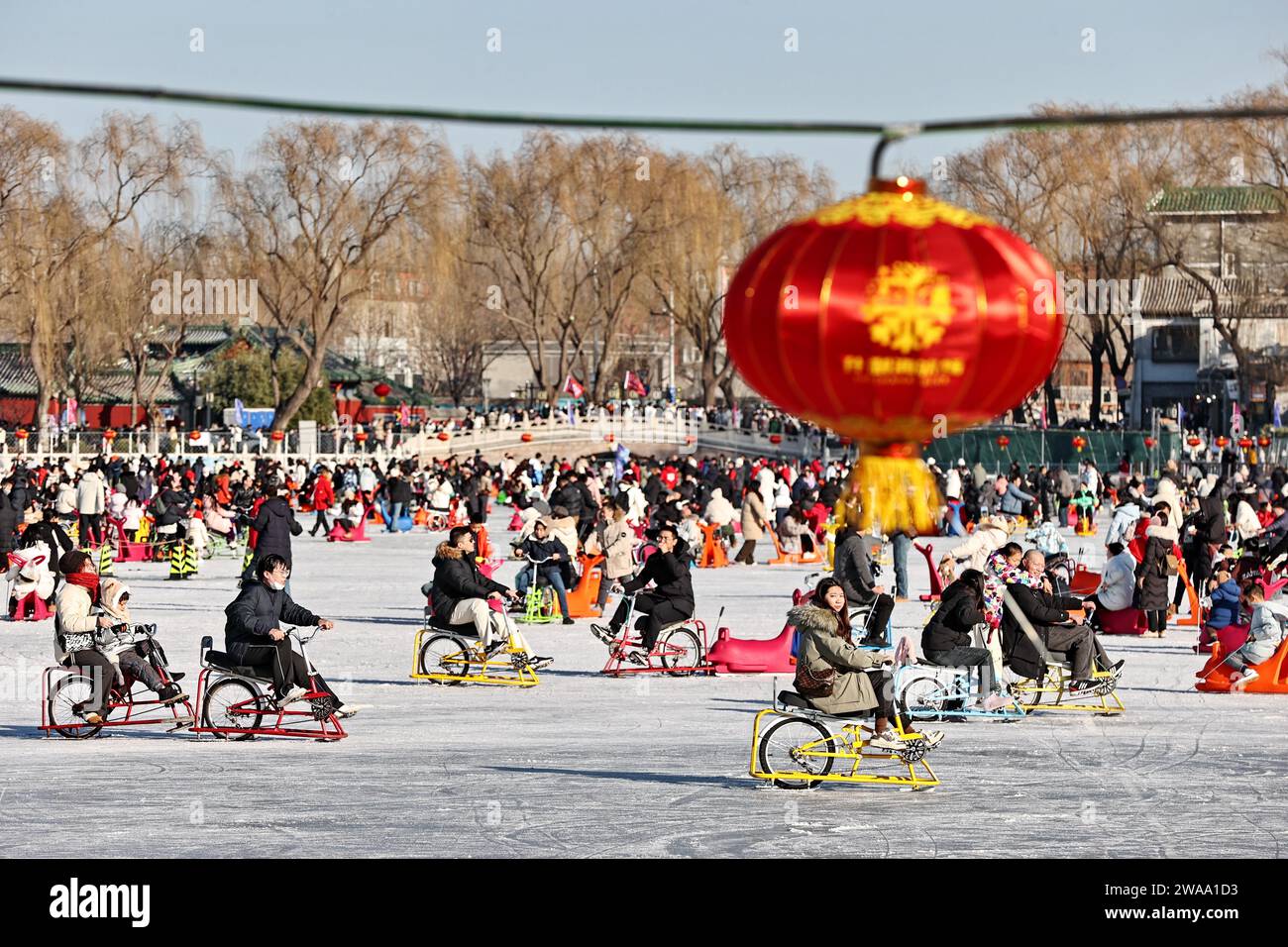 Tourists enjoy ice and snow fun at Shichahai ice rink in Beijing, China ...