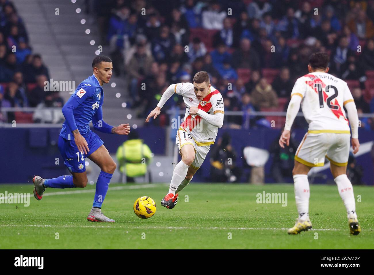 Mason Greenwood of Getafe CF and Jorge de Frutos of Rayo Vallecano ...